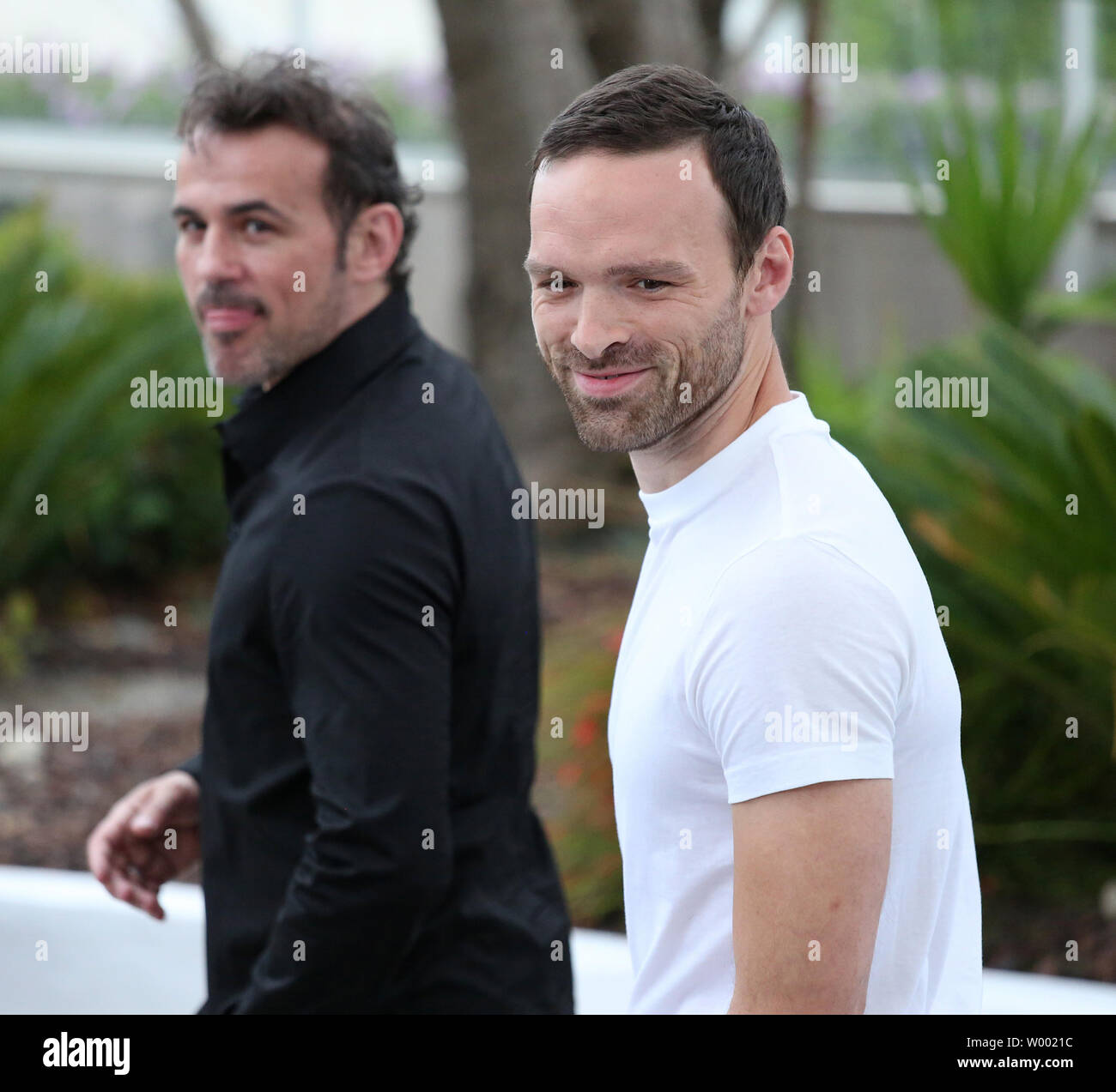 Stephane Rideau (L) and Alban Lenoir arrive at a photocall for the film ...