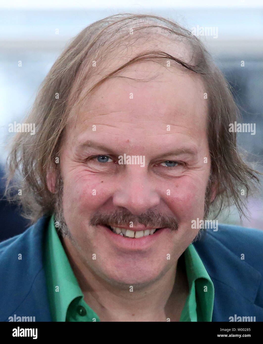 Philippe Katerine arrives at a photocall for the film "Le grand bain ...