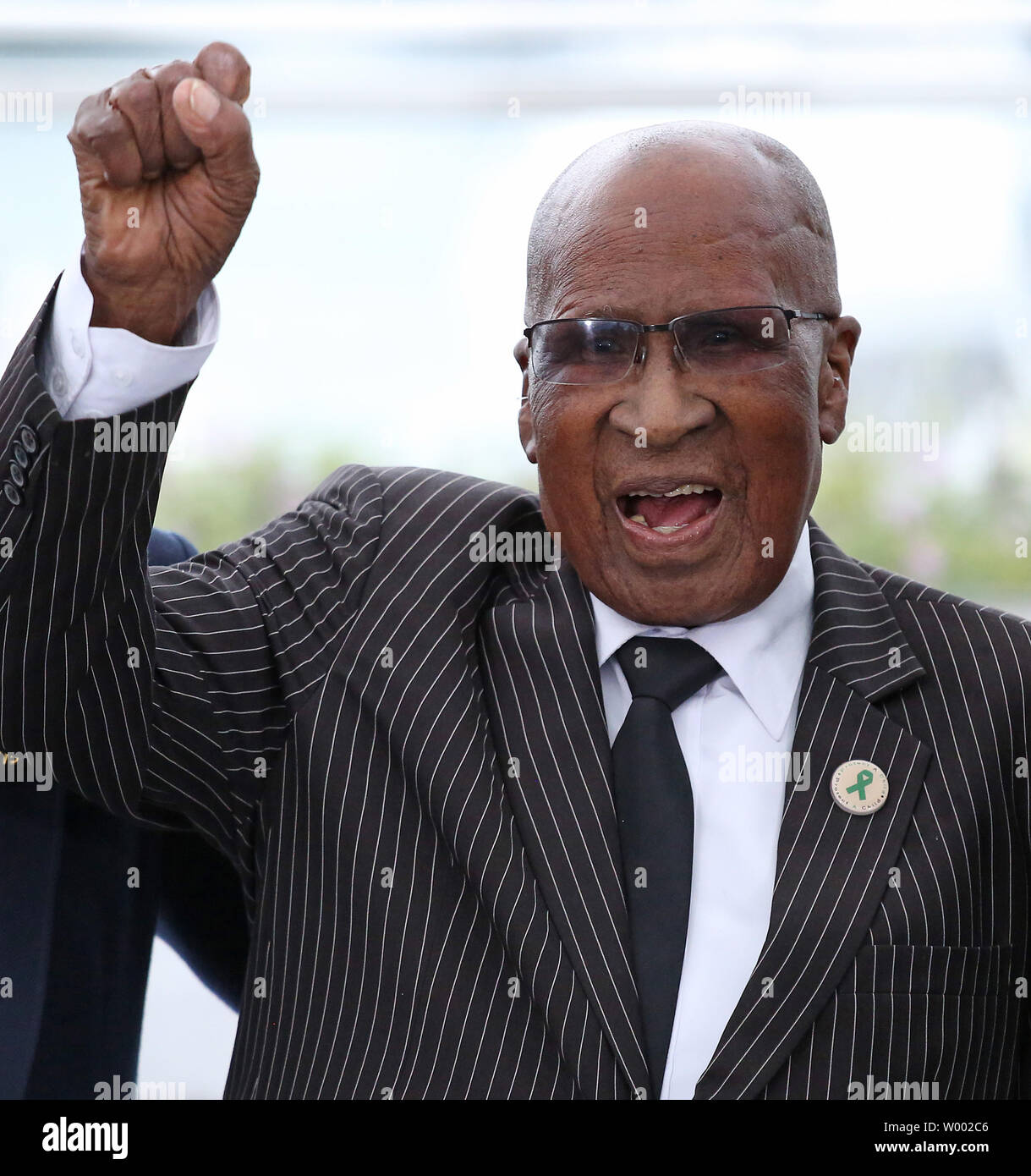 Andrew Mlangeni arrives at a photocall for the film "The State Against ...