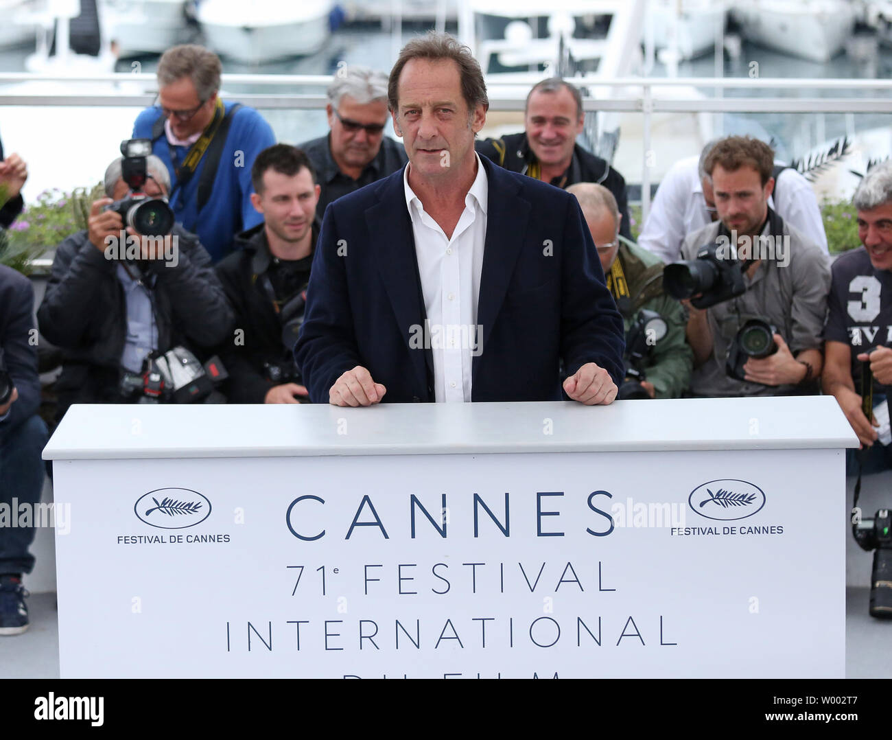 Vincent Lindon arrives at a photocall for the film "In War (En Guerre ...
