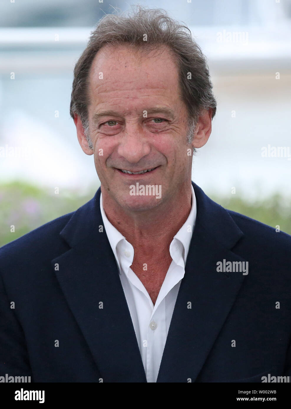 Vincent Lindon arrives at a photocall for the film "In War (En Guerre ...
