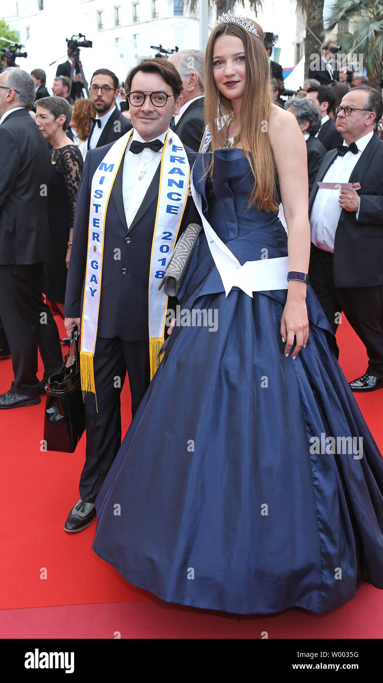 Bruno Solari (L) and Livia Hoarau arrive on the red carpet before the ...