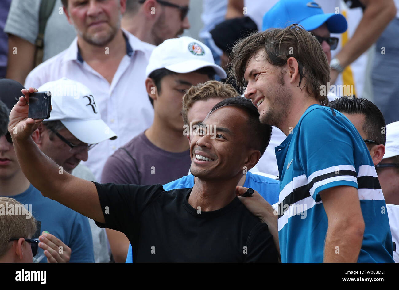 American Jared Donaldson poses for a selfie with a fan after winning ...