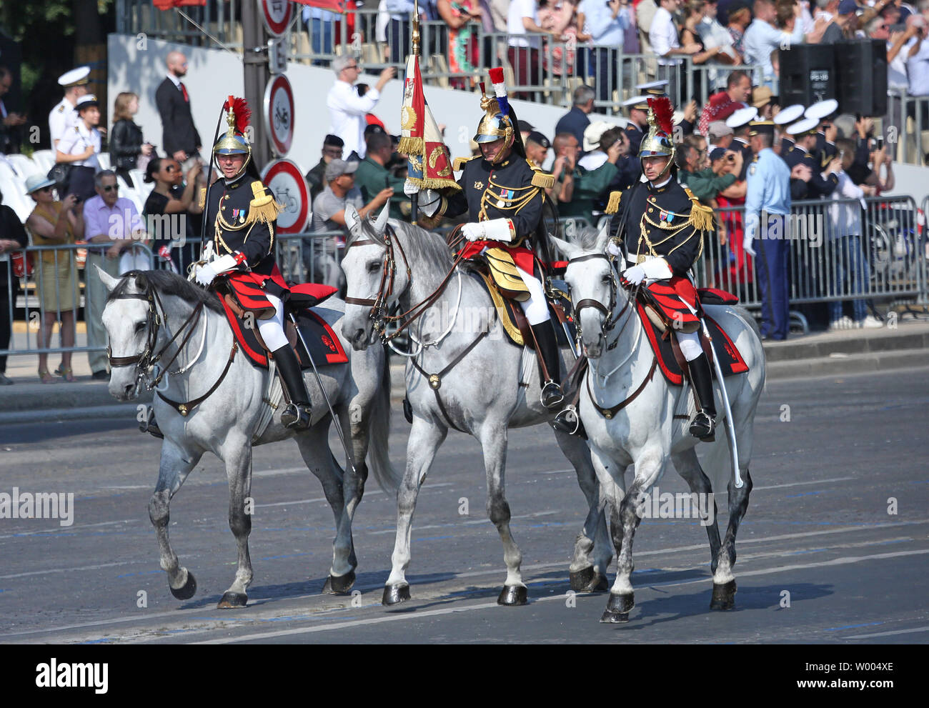 French soldiers on horseback participate in the annual Bastille Day ...