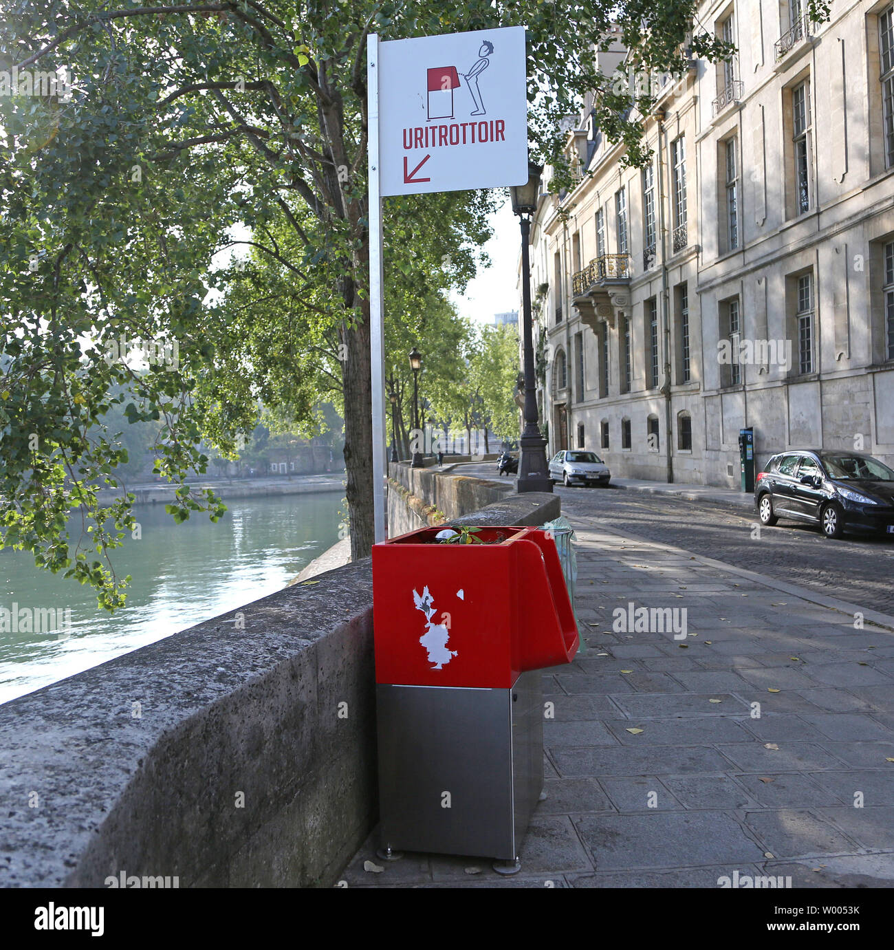 A new, open-air urinal is seen on Ile Saint-Louis in Paris on August 16 ...
