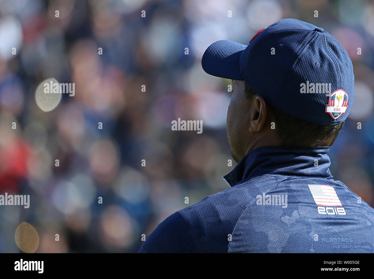 Tiger Woods watches his opponents on the 9th green on day two of the ...