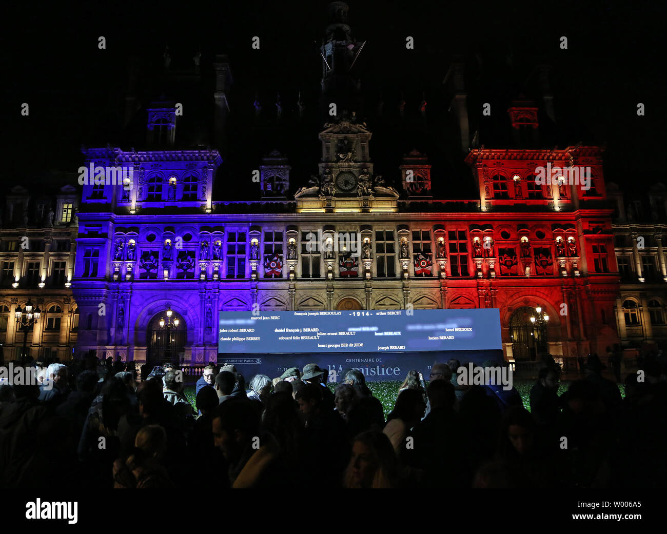 City Hall is seen lit in the colors of the French flag in Paris on ...