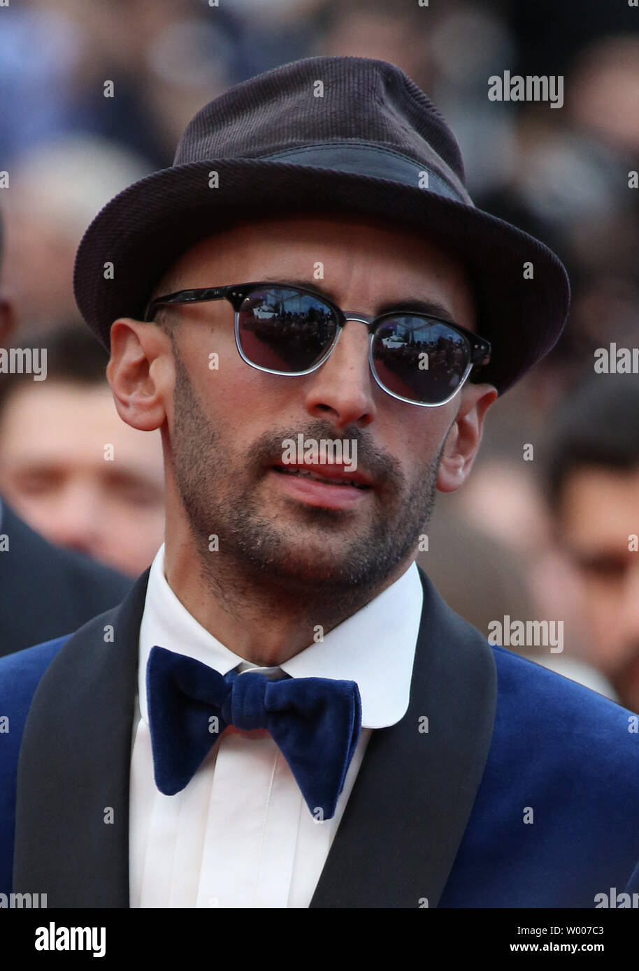 French photographer JR arrives on the red carpet before the screening ...