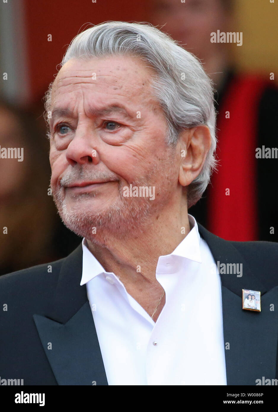 Alain Delon arrives on the red carpet before the screening of the film ...