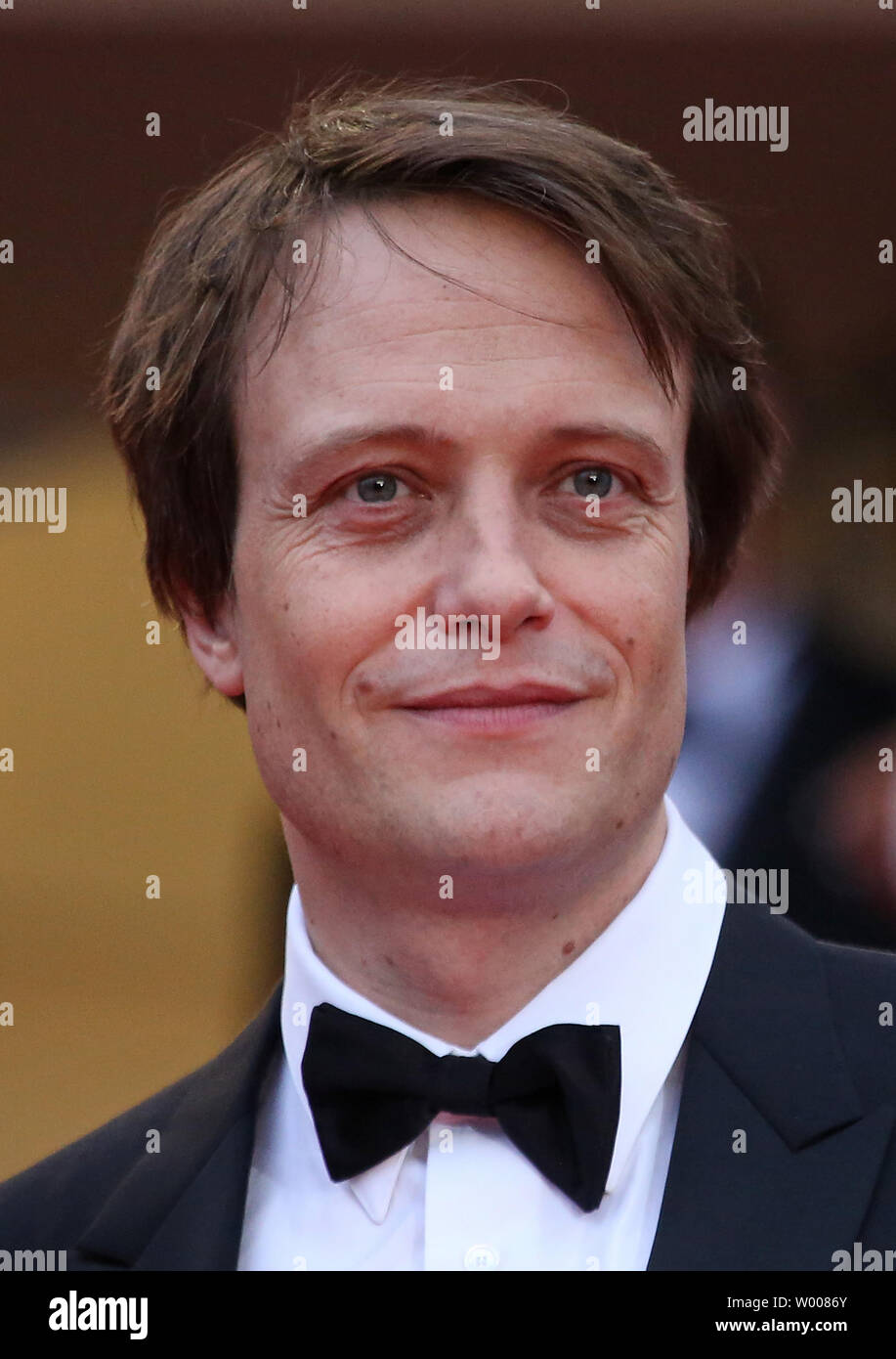 August Diehl arrives on the red carpet before the screening of the film ...