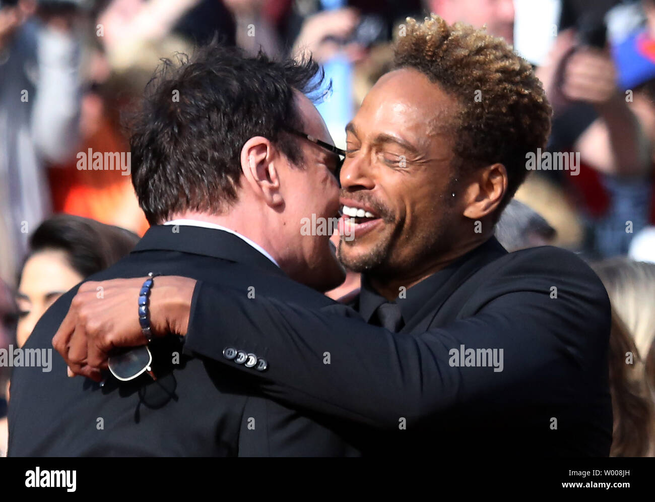 Quentin Tarantino (L) and Gary Dourdan arrive on the red carpet before ...