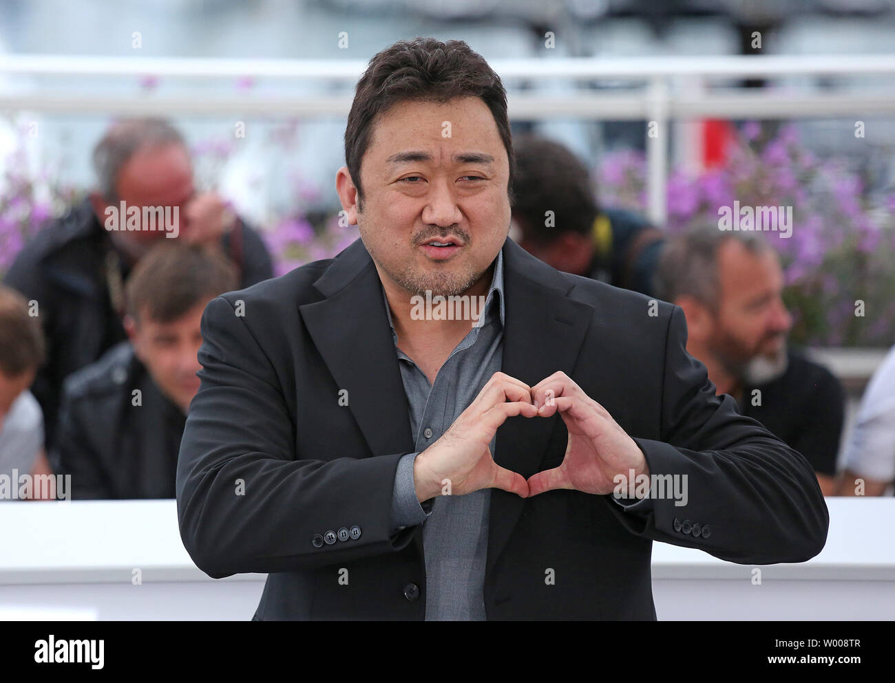 Don Lee arrives at a photocall for the film "The Gangster, The Cop, The ...