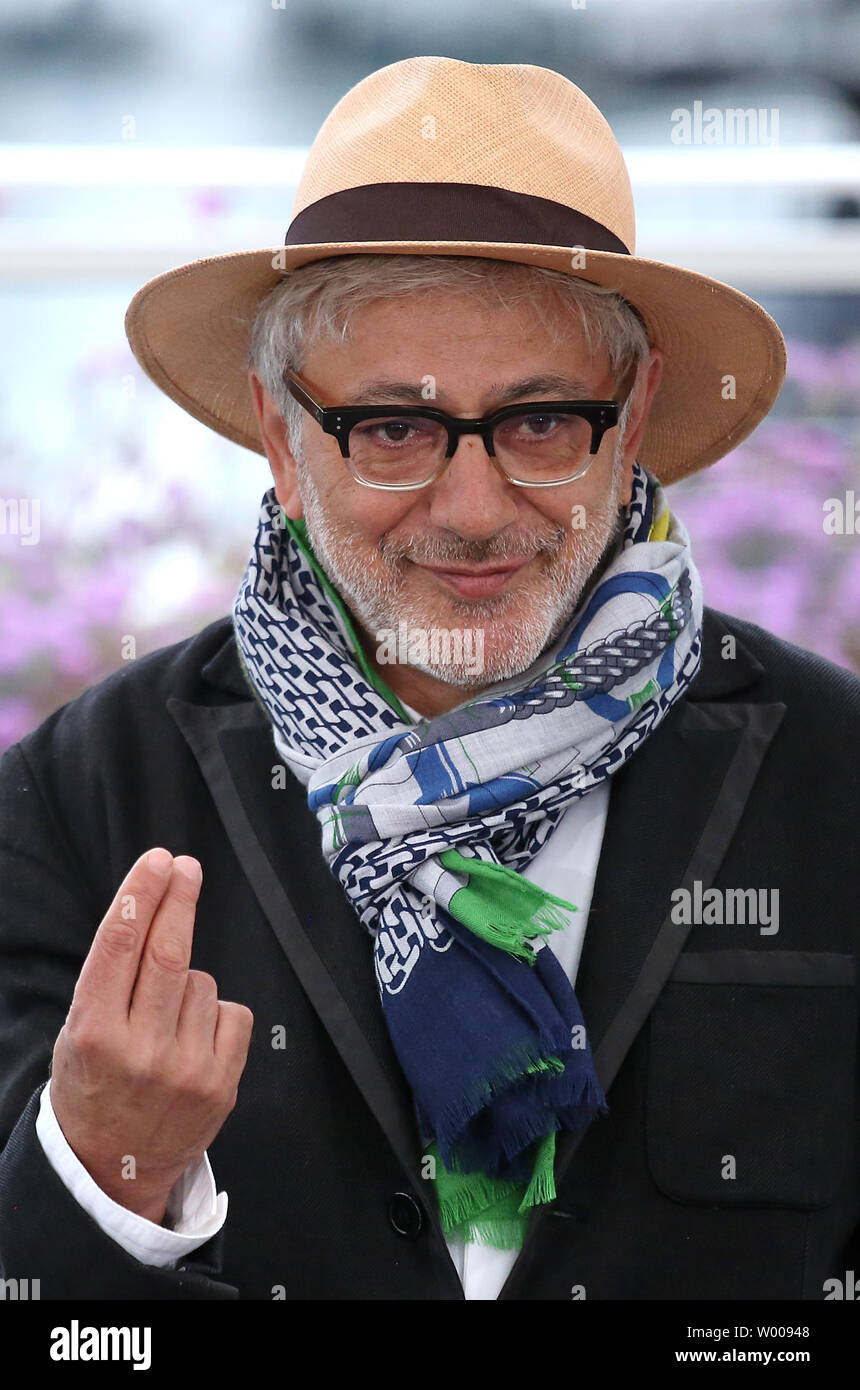 Elia Suleiman arrives at a photocall for the film "It Must Be Heaven ...