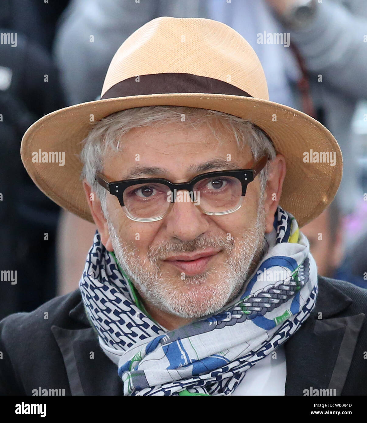 Elia Suleiman arrives at a photocall for the film "It Must Be Heaven ...