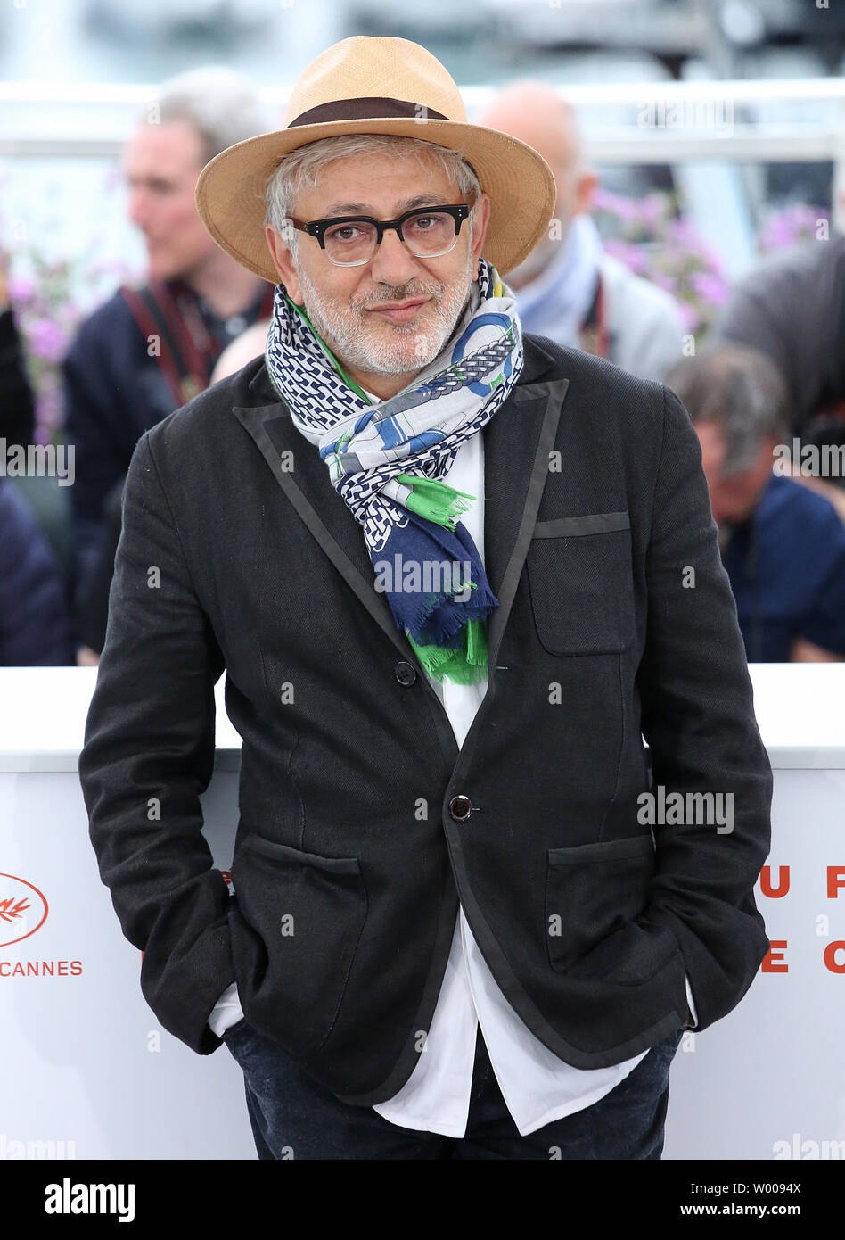 Elia Suleiman arrives at a photocall for the film "It Must Be Heaven ...