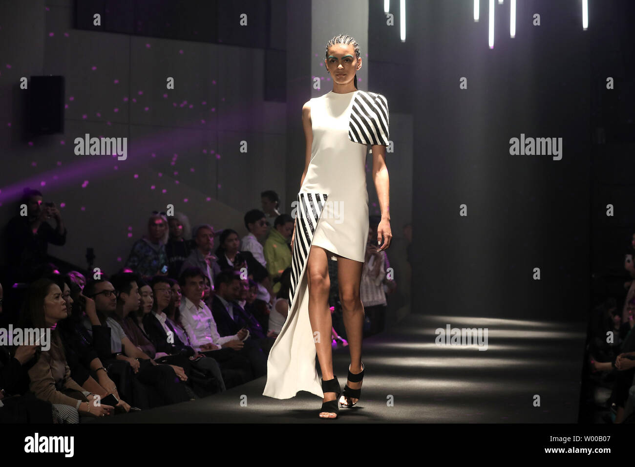 A model takes to the catwalk during Guy Laroche's show as part of the ...