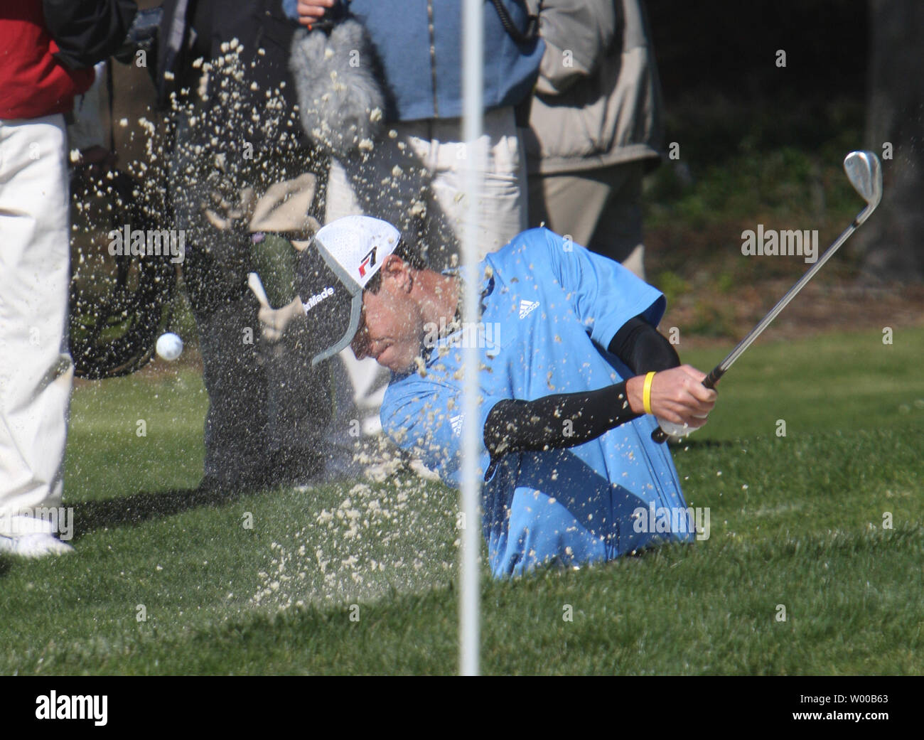 Talk show host Carson Daly blasts out of as bunker to the green on the ...