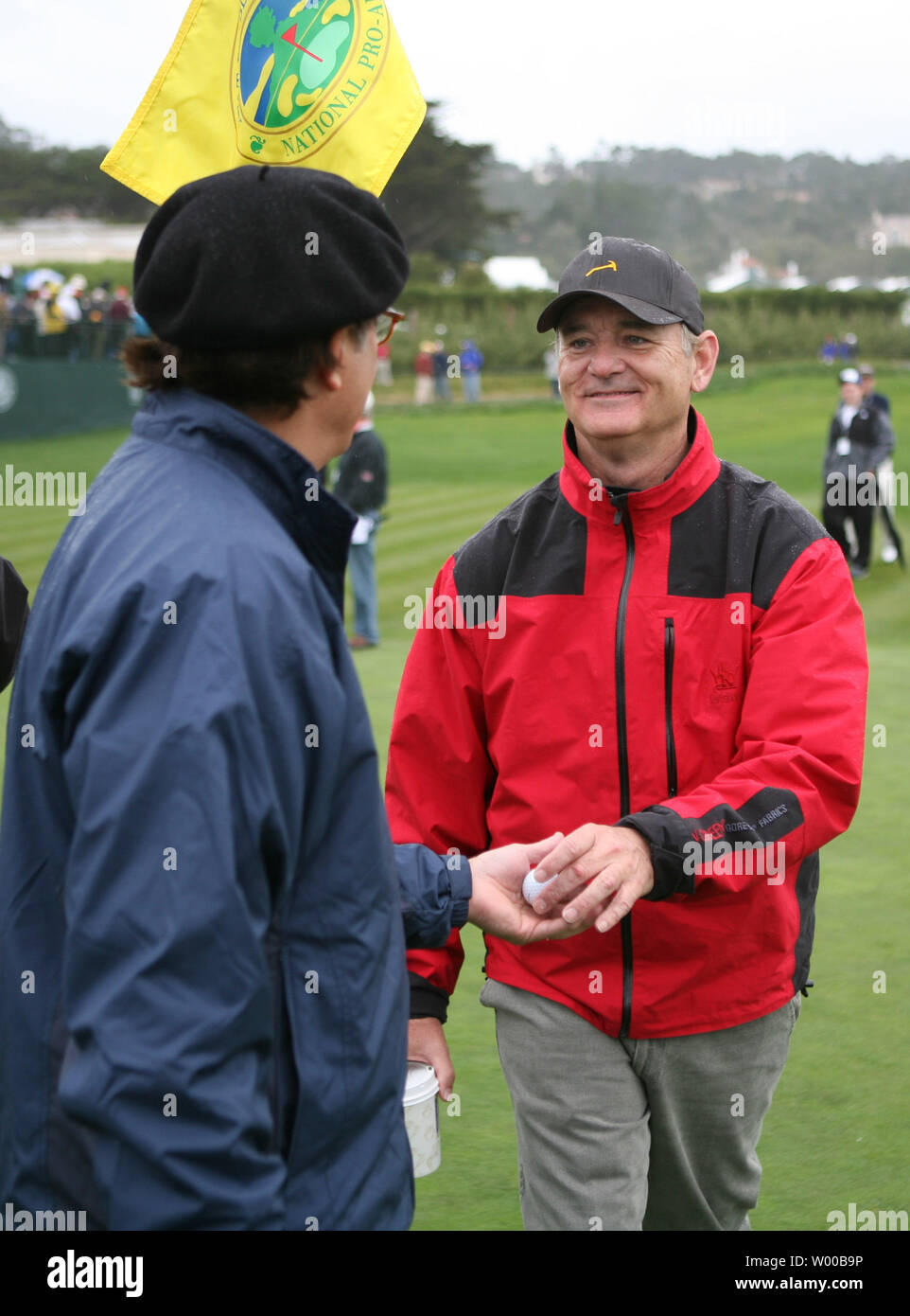 Bill Murray hands Andy Garica his golf ball on the 17th hole at the AT ...