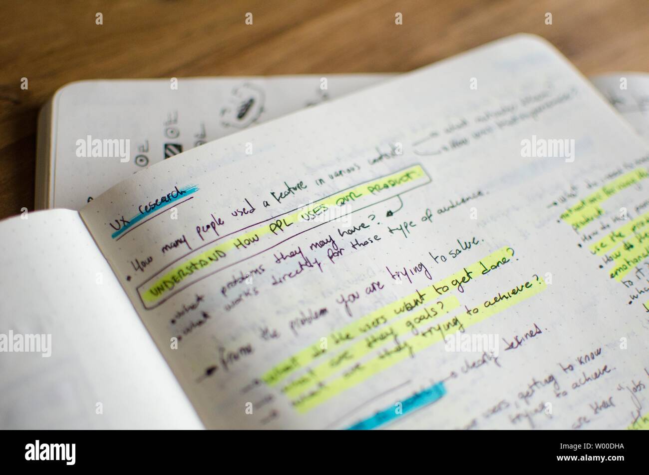 Closeup of UI/UX draft sheet with highlighted areas with a magic marker ...