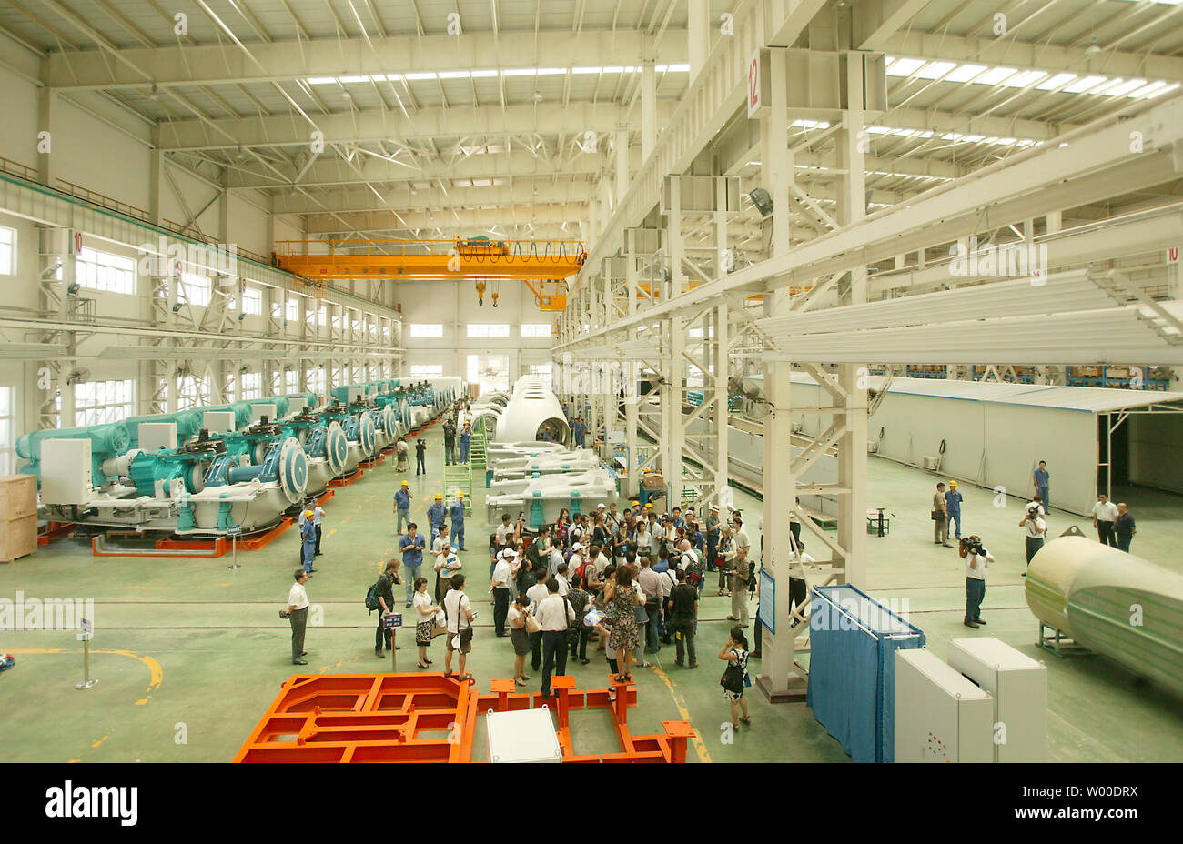 Reporters tour the Tianwei Wind Power assembly factory in Baoding City ...