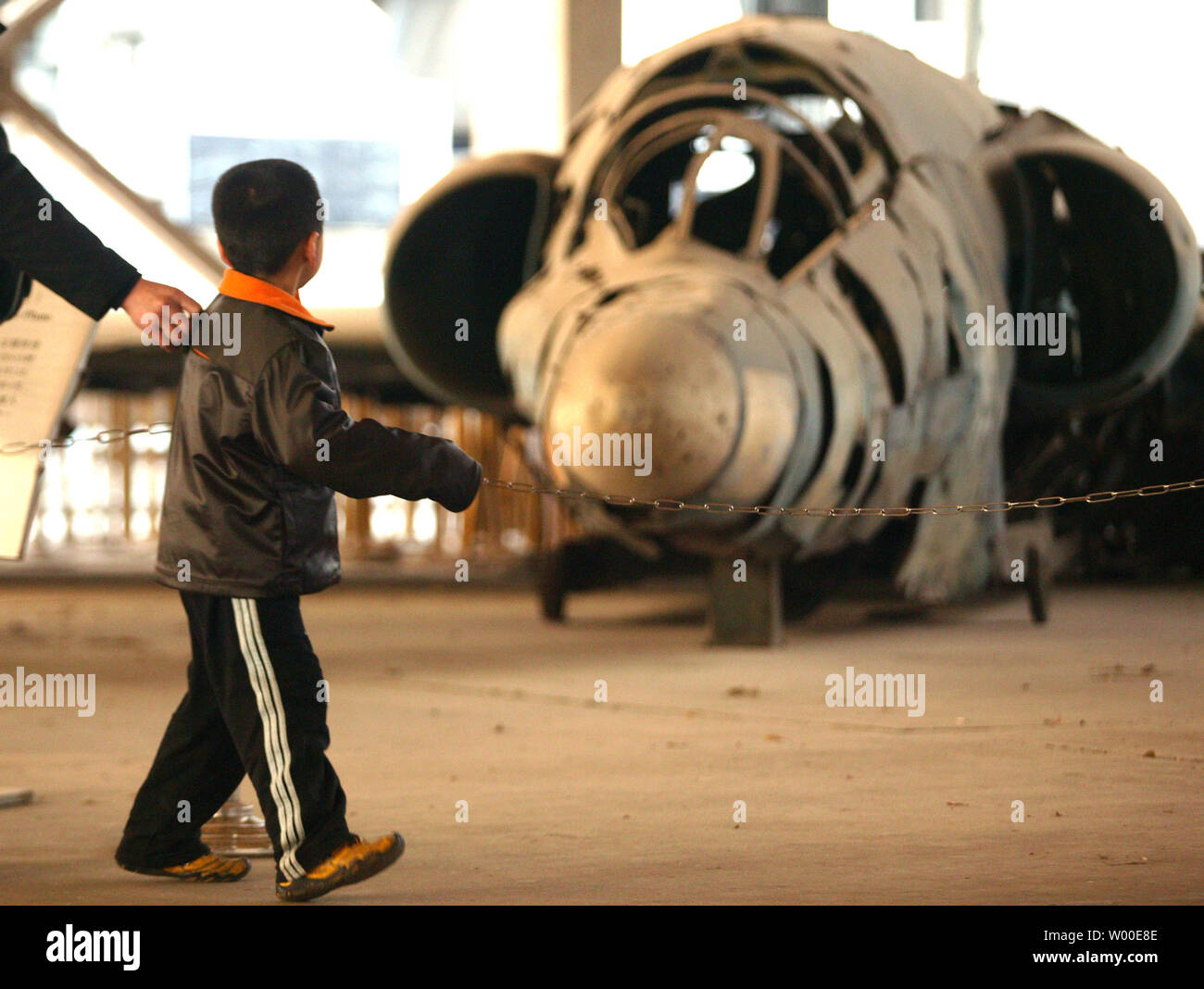 Chinese figure walks High Resolution Stock Photography and Images - Alamy