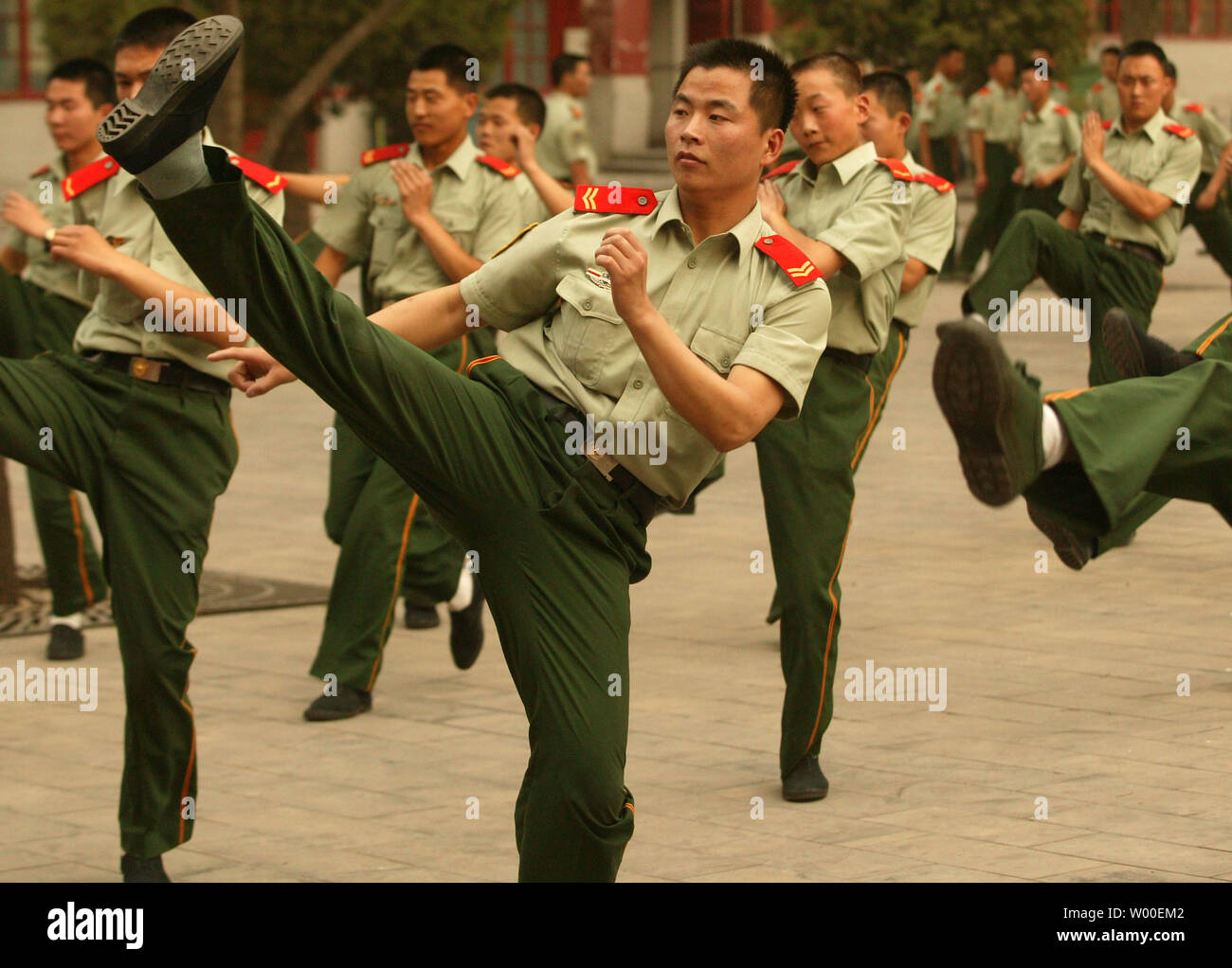 A Chinese paramilitary police do martial arts exercises in their ...