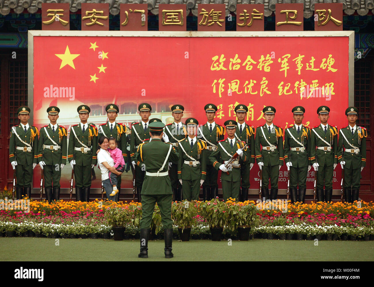 Chinese People's Liberation Army (PLA) soldiers pose for photos during ...