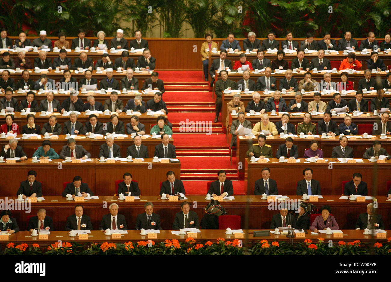 China's leaders and delegates assemble inside the Great Hall of the ...