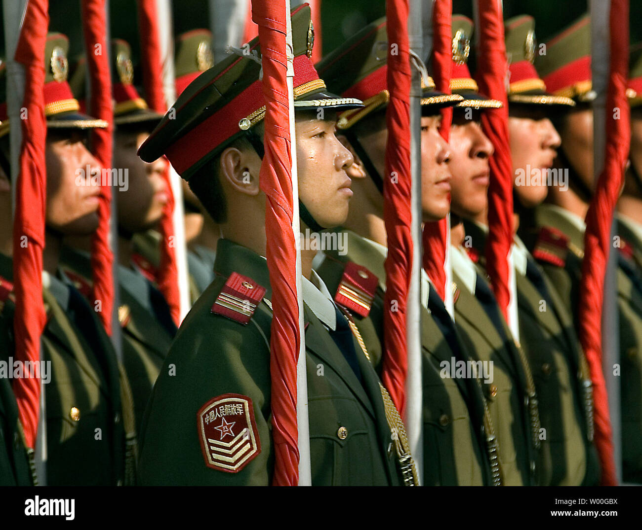 People's Liberation Army soldiers drill outside their barracks adjacent ...