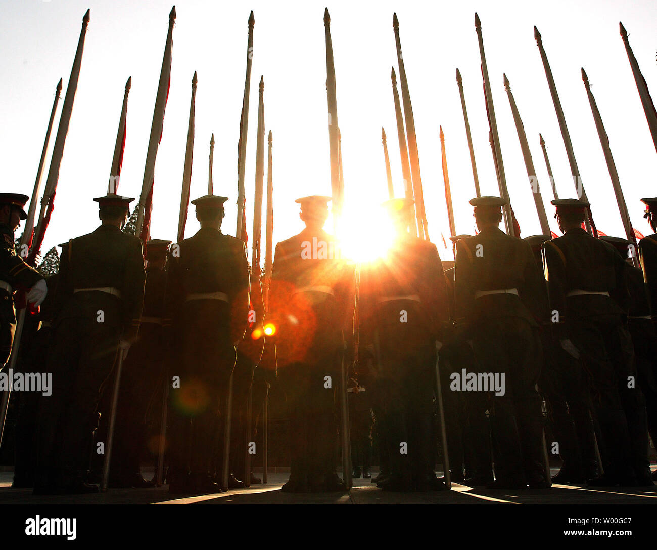 People's Liberation Army soldiers drill outside their barracks adjacent ...
