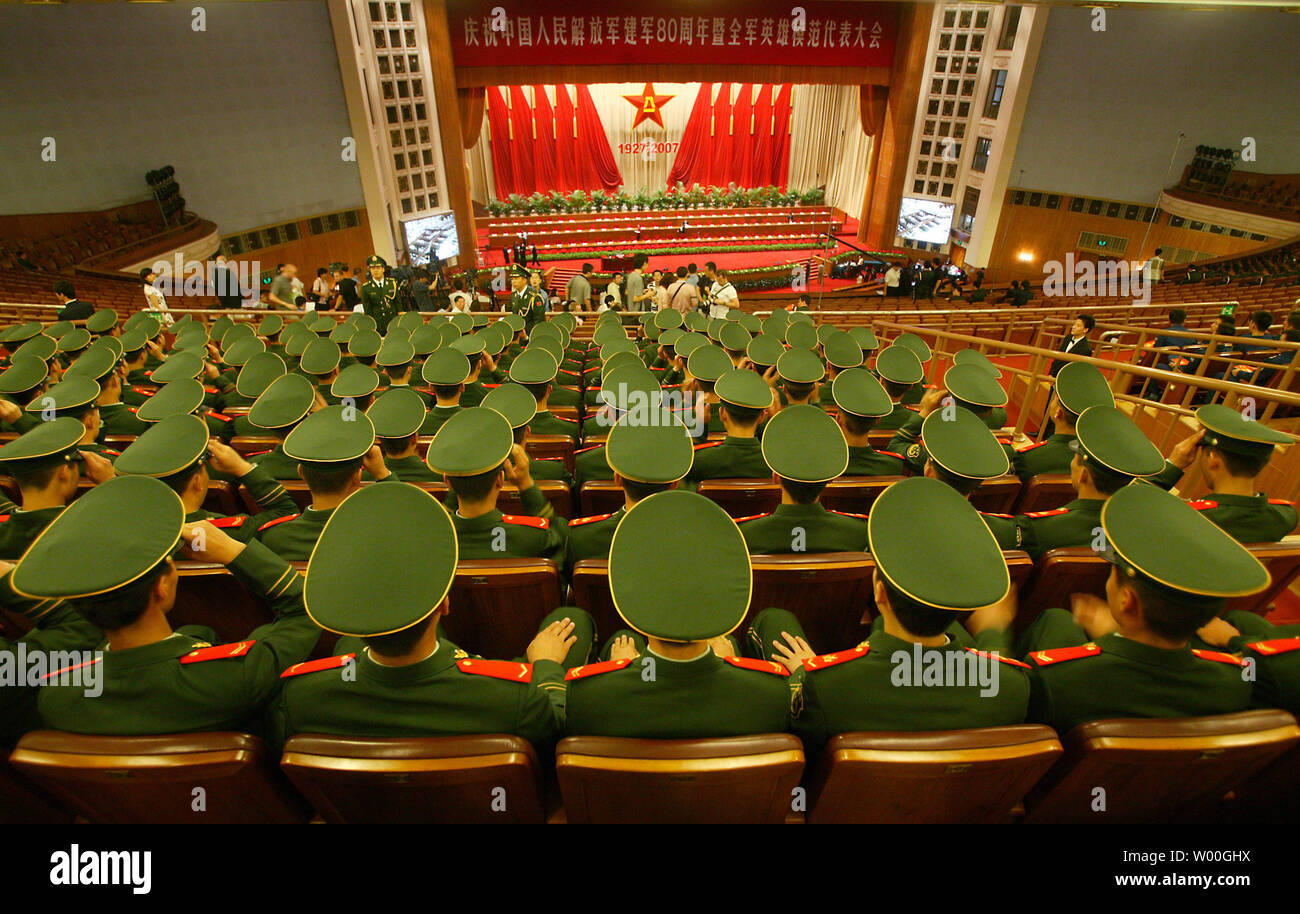 People's Liberation Army (PLA) soldiers attend a grand rally to ...