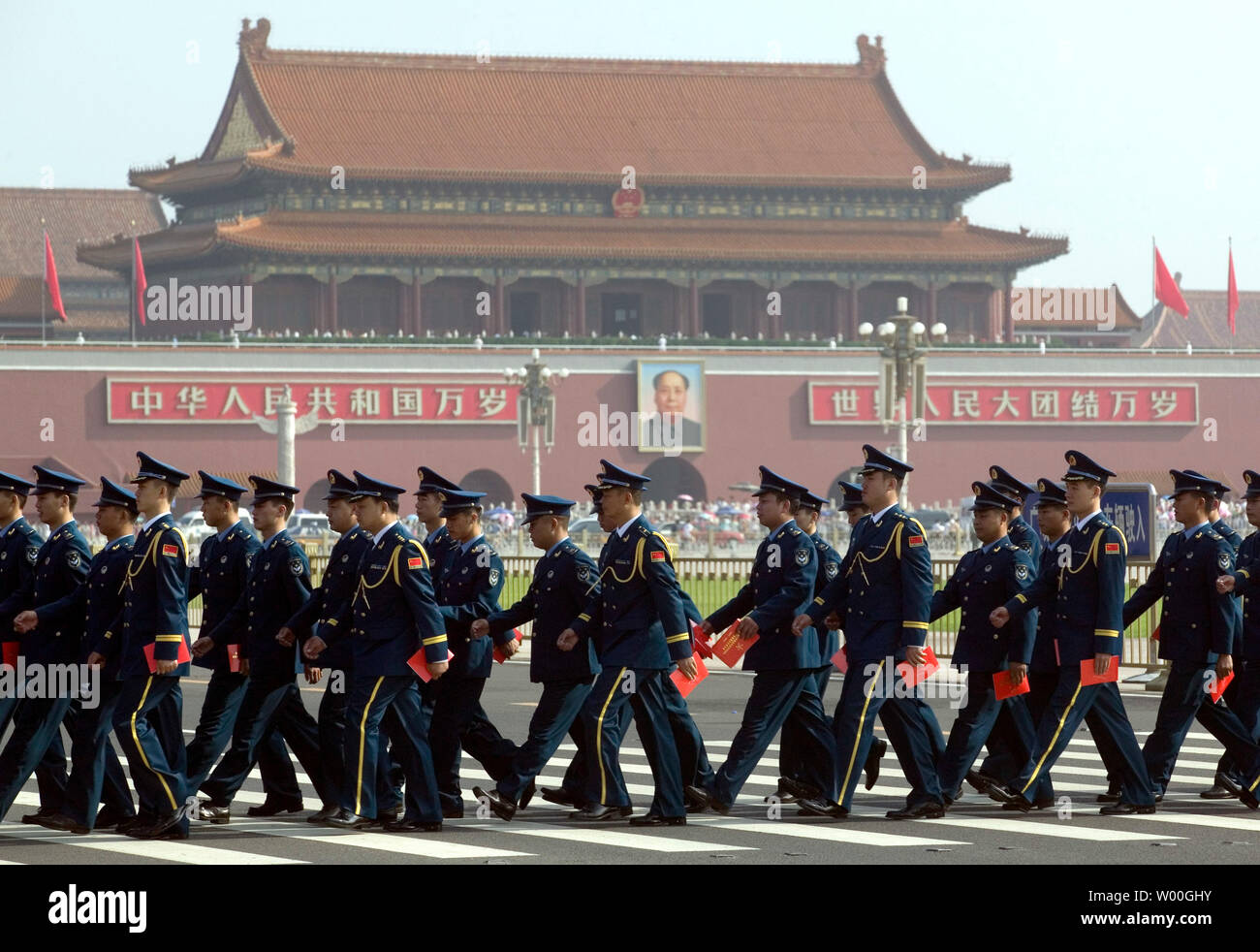 People's Liberation Army (PLA) soldiers arrive for a grand rally to ...