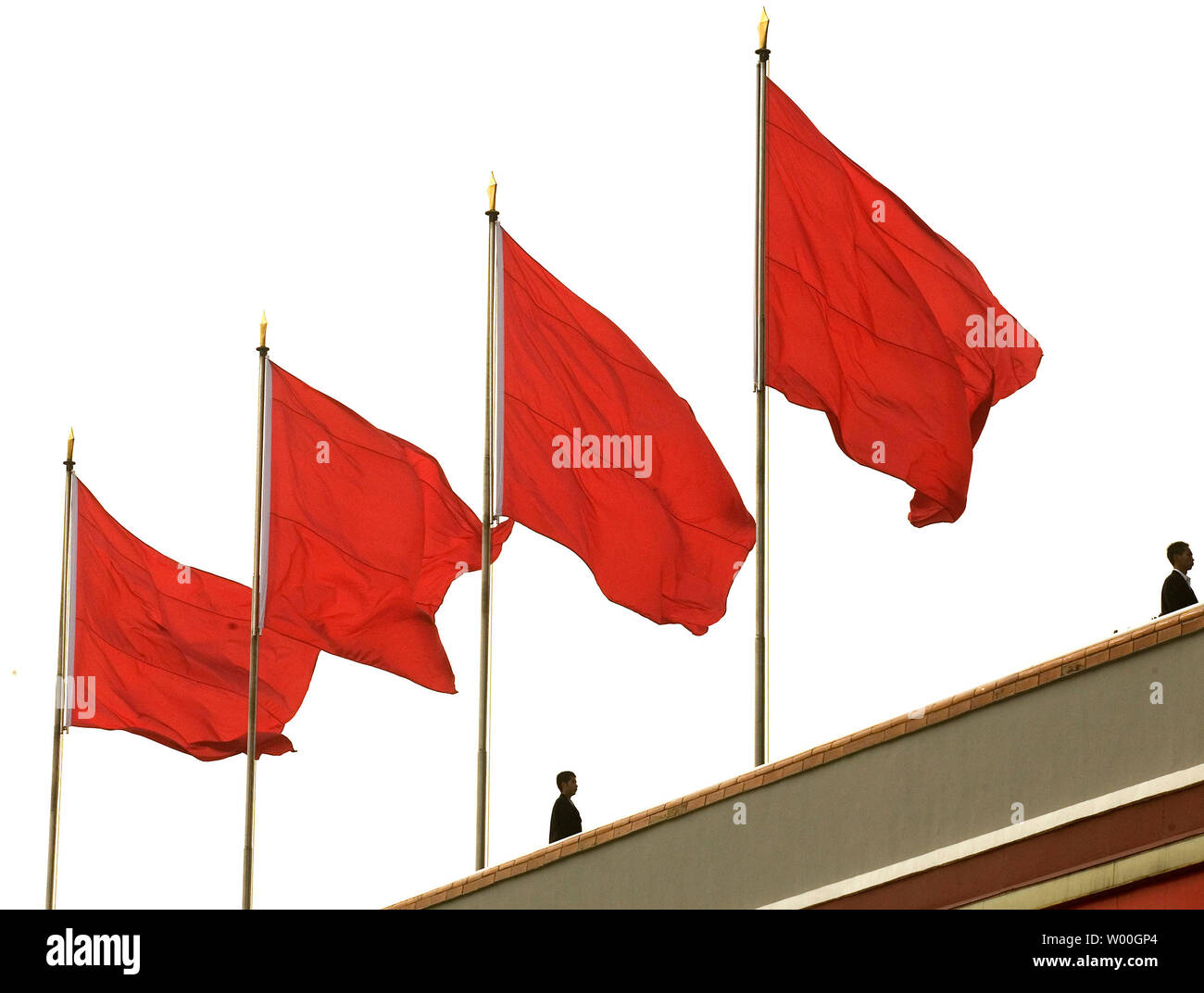 Chinese police officers stand on guard atop Tienanmen Square's north ...