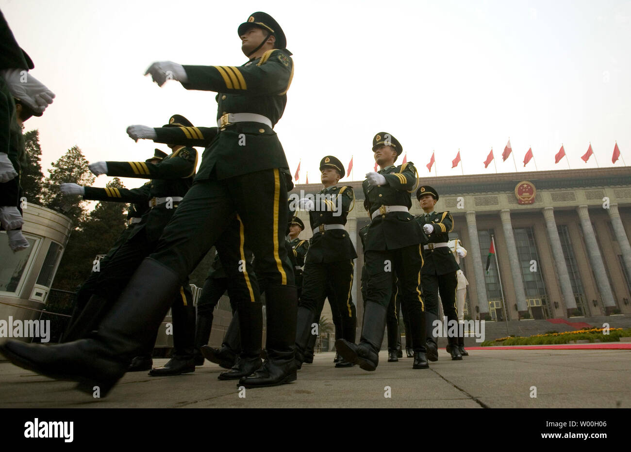 A Chinese military honor guard marches before a welcoming ceremony for ...