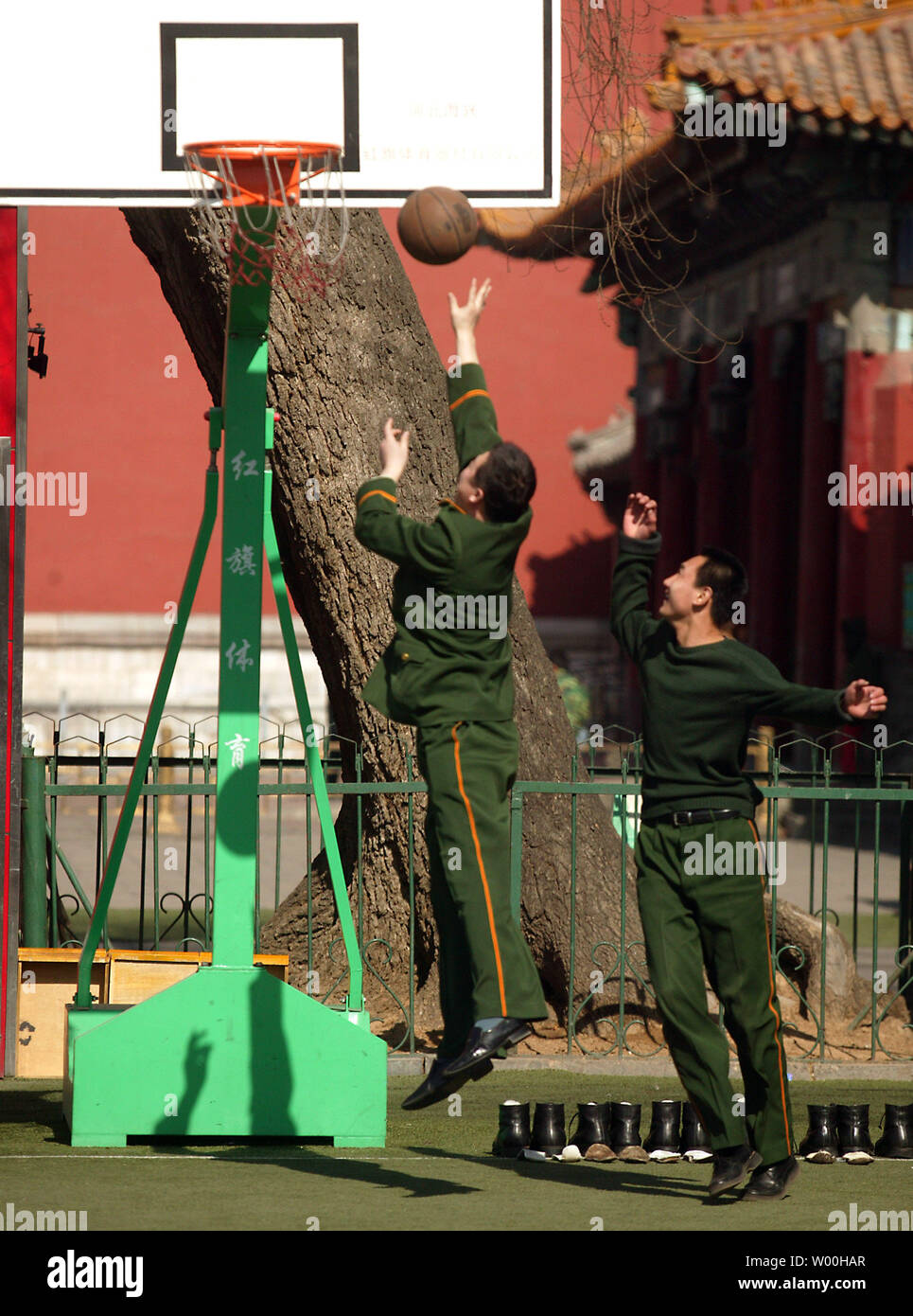 Chinese People's armed Police soldiers play basketball between drills ...
