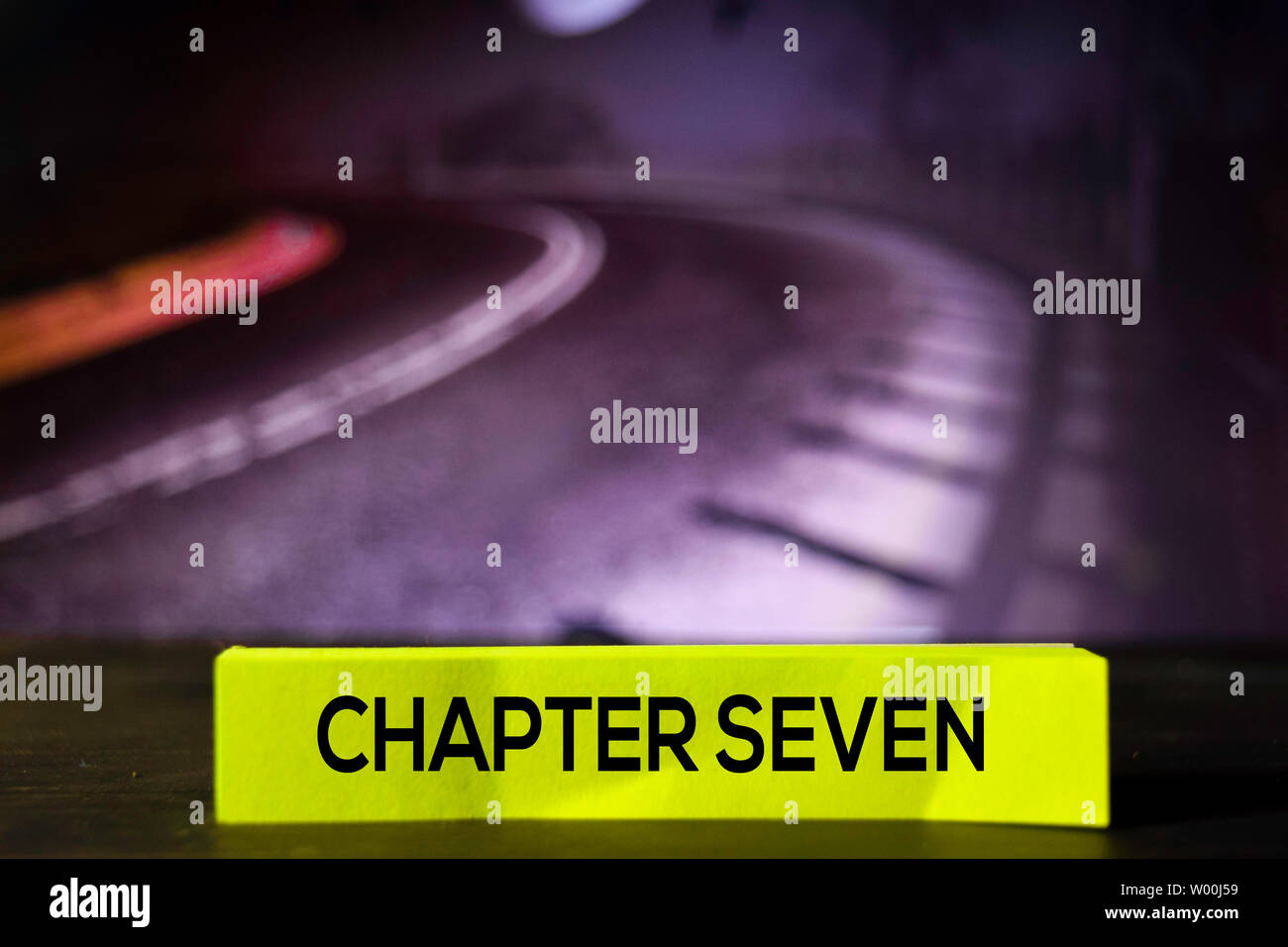 Chapter Seven on the sticky notes with bokeh background Stock Photo - Alamy