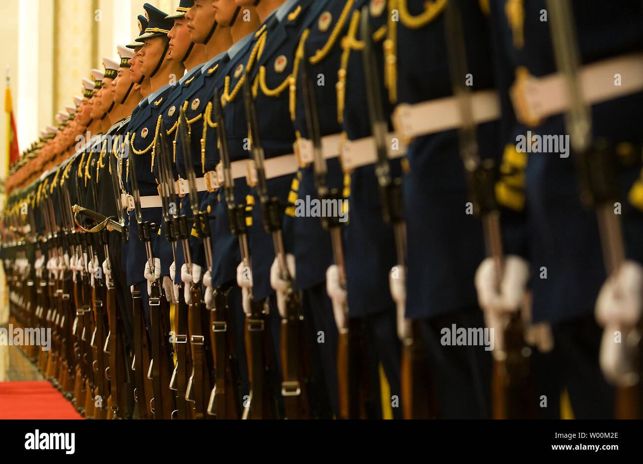 Chinese soldiers perform honor guard duties for Uruguay's President Tabare Vazquez during an ...