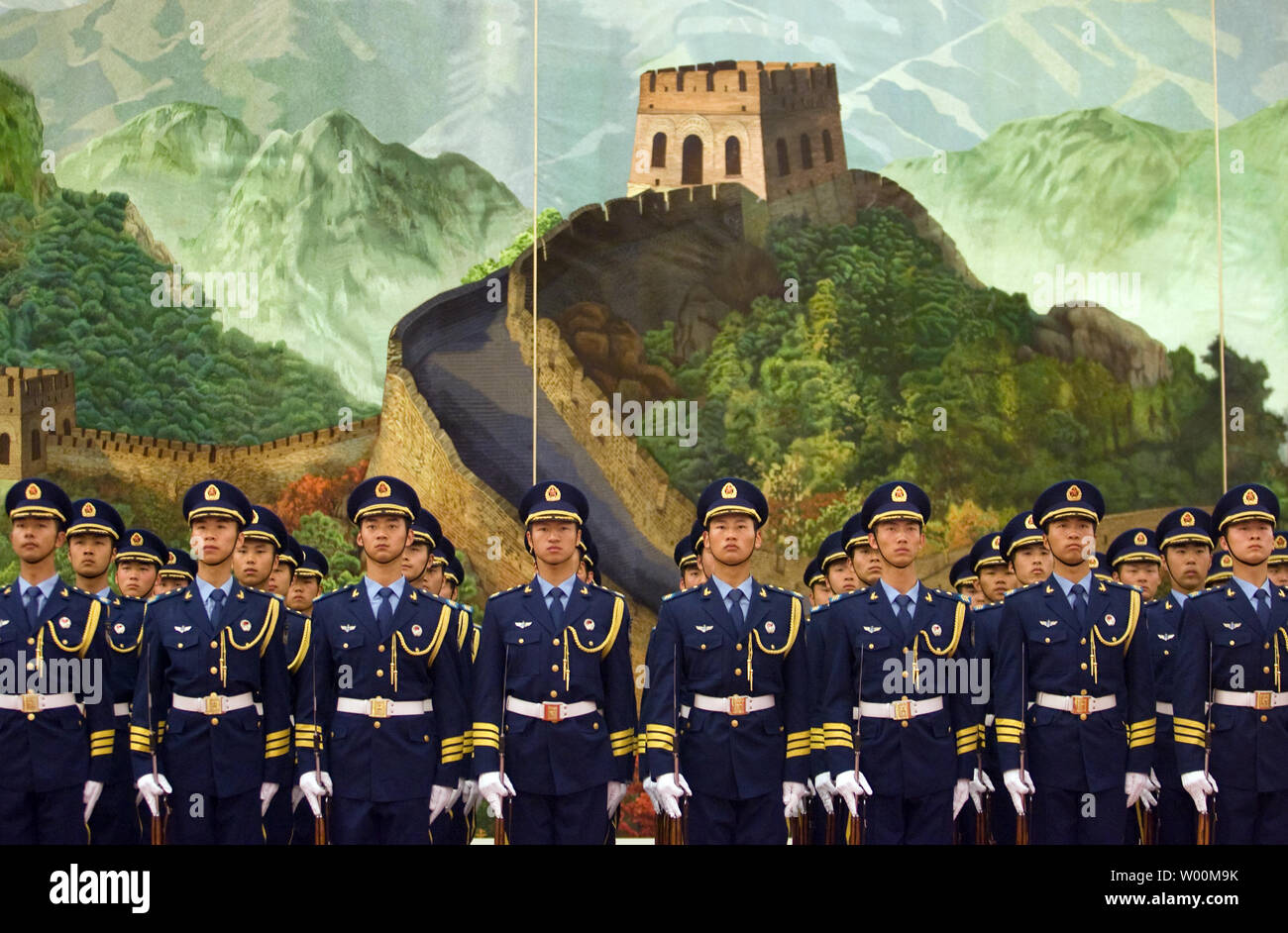 Chinese soldiers perform honor guard duties during a welcoming ceremony ...