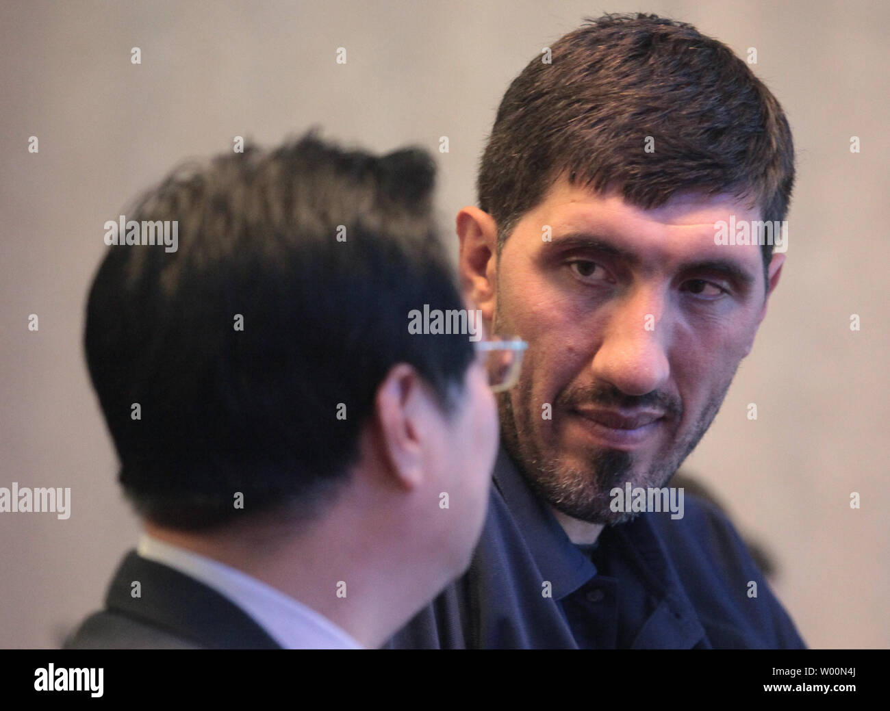 Former Washington Bullet Gheorghe Muresan (R) of Romania, one of the ...