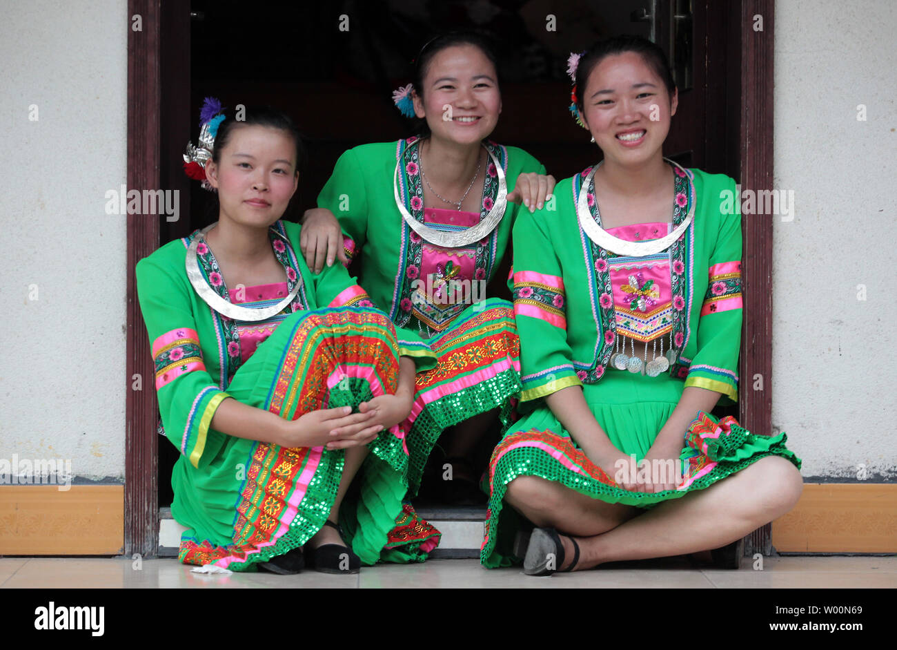 Dong ethnic minorities wear traditional garb during a cultural ...