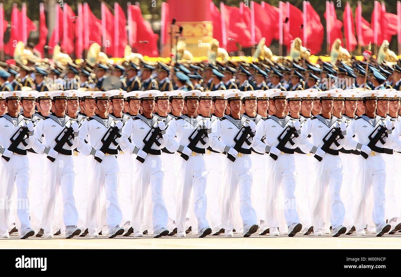 Chinese soldiers participate in a massive military parade celebrating ...