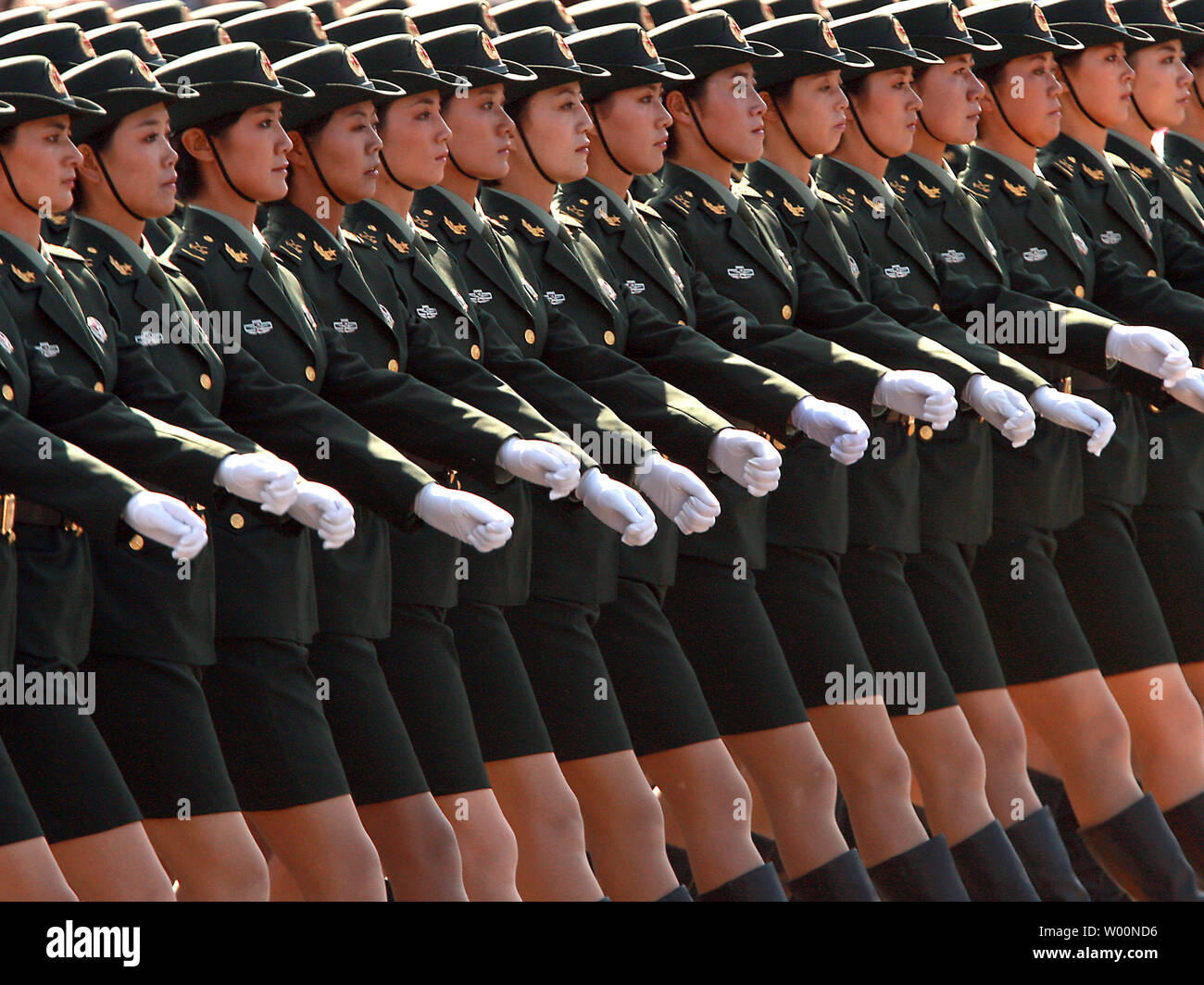 Chinese soldiers participate in a massive military parade celebrating ...