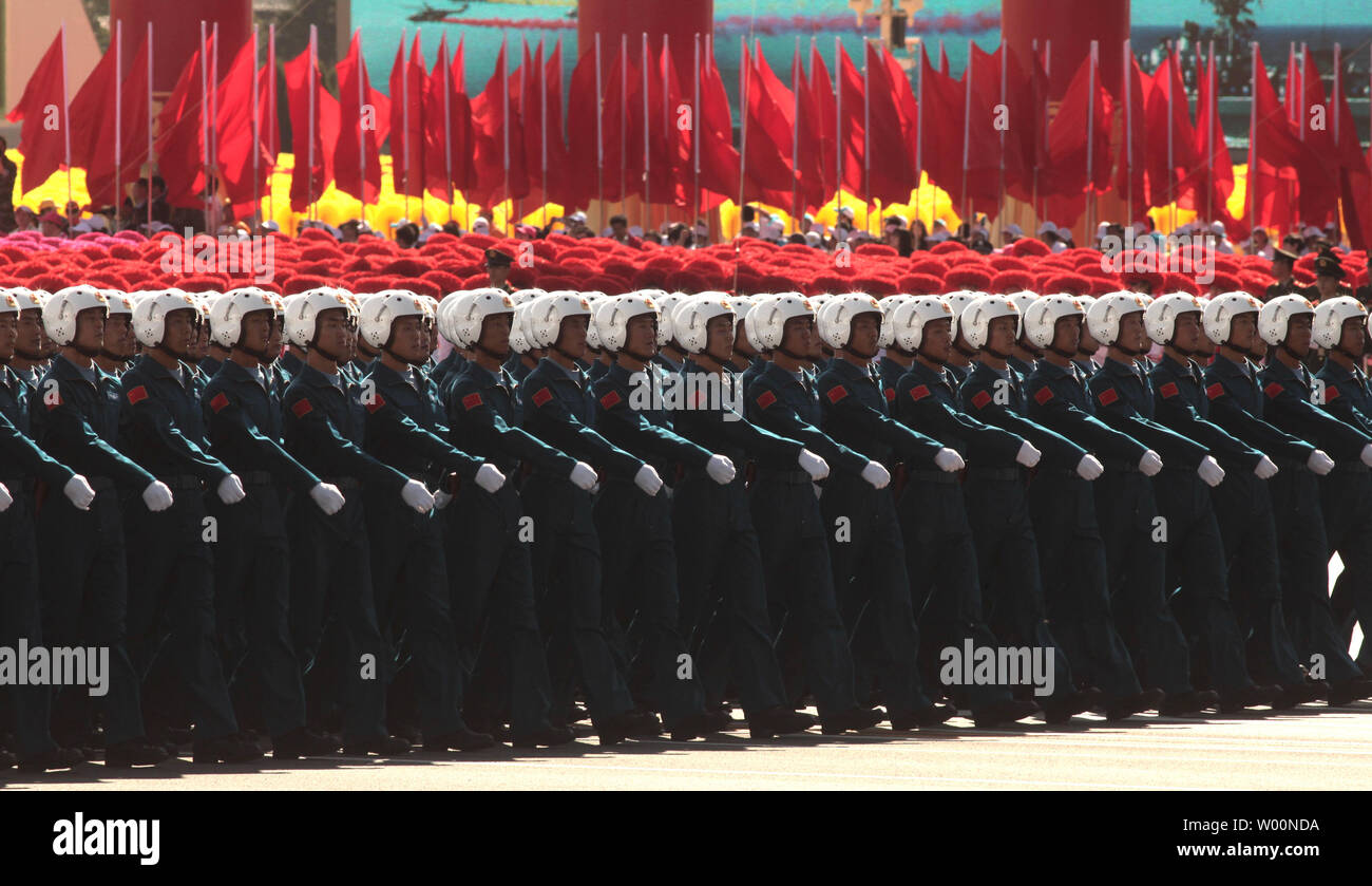 Chinese soldiers participate in a massive military parade celebrating ...