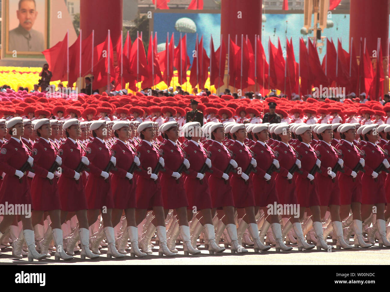 Chinese soldiers participate in a massive military parade celebrating ...