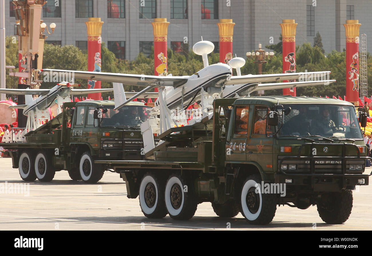Chinese soldiers participate in a massive military parade celebrating ...