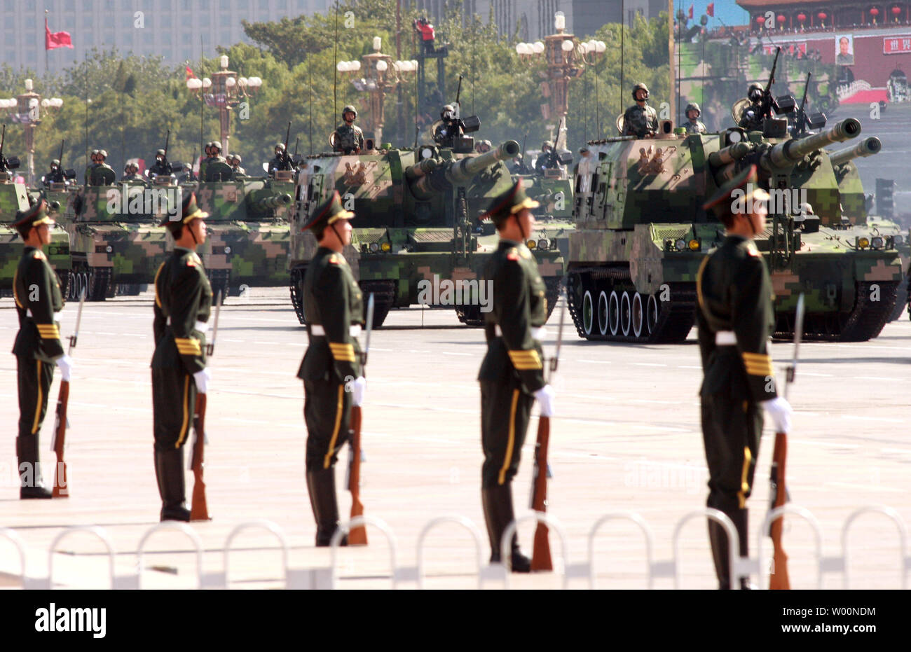 Chinese soldiers participate in a massive military parade celebrating ...