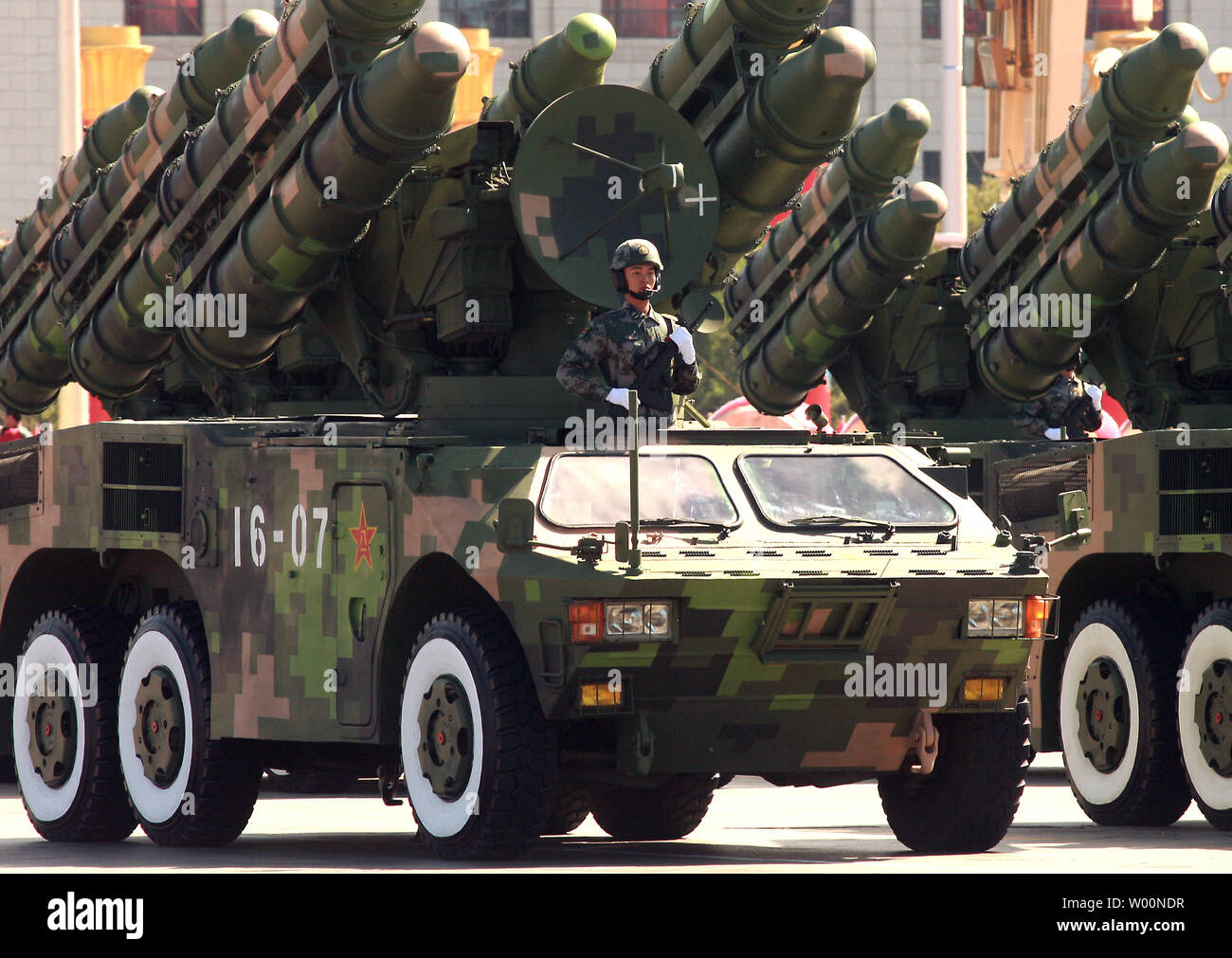 Chinese soldiers participate in a massive military parade celebrating ...