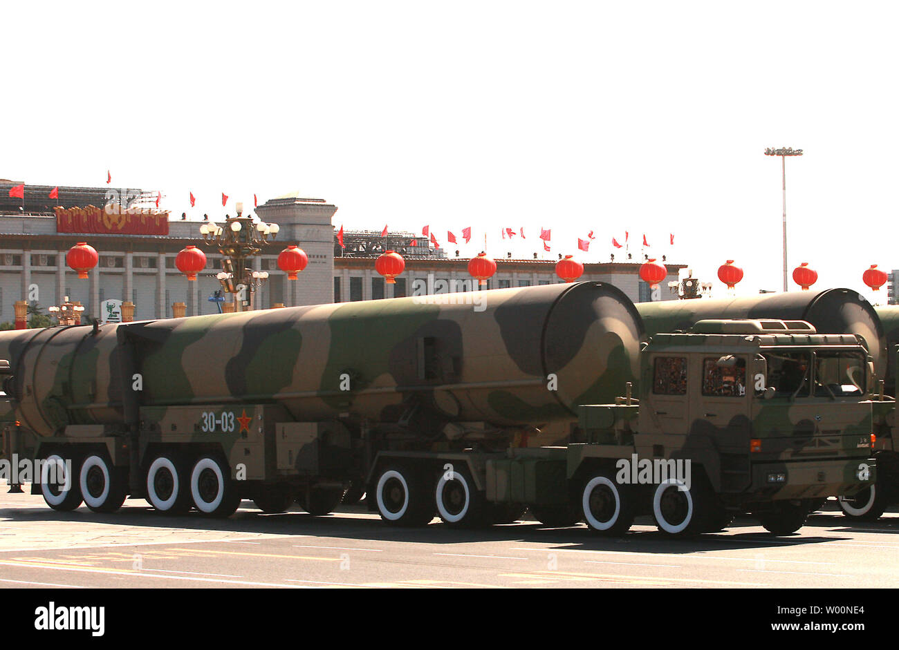 Chinese soldiers participate in a massive military parade celebrating ...