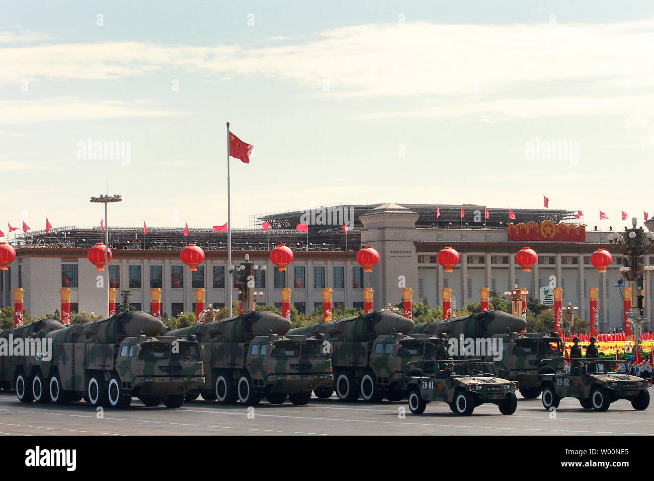 Chinese soldiers participate in a massive military parade celebrating ...