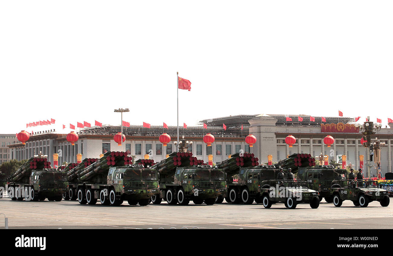 Chinese soldiers participate in a massive military parade celebrating ...